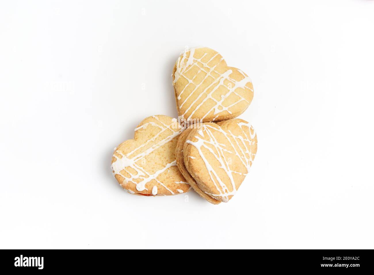 a heart-shaped shortbread biscuit on a white background Stock Photo - Alamy