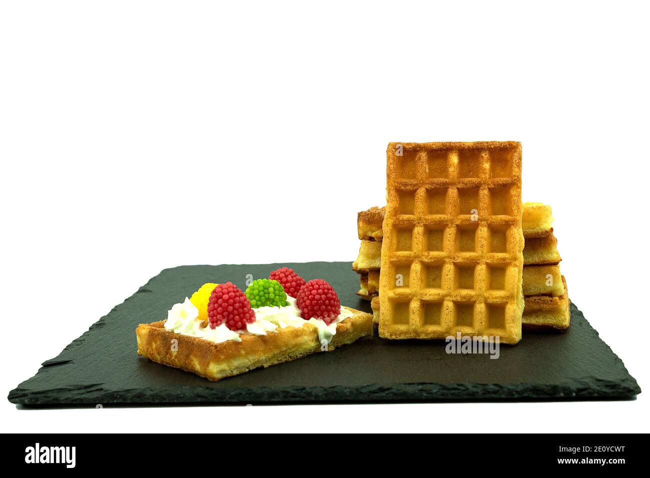 Chocolates of different colors and delicious Belgian waffles Stock ...