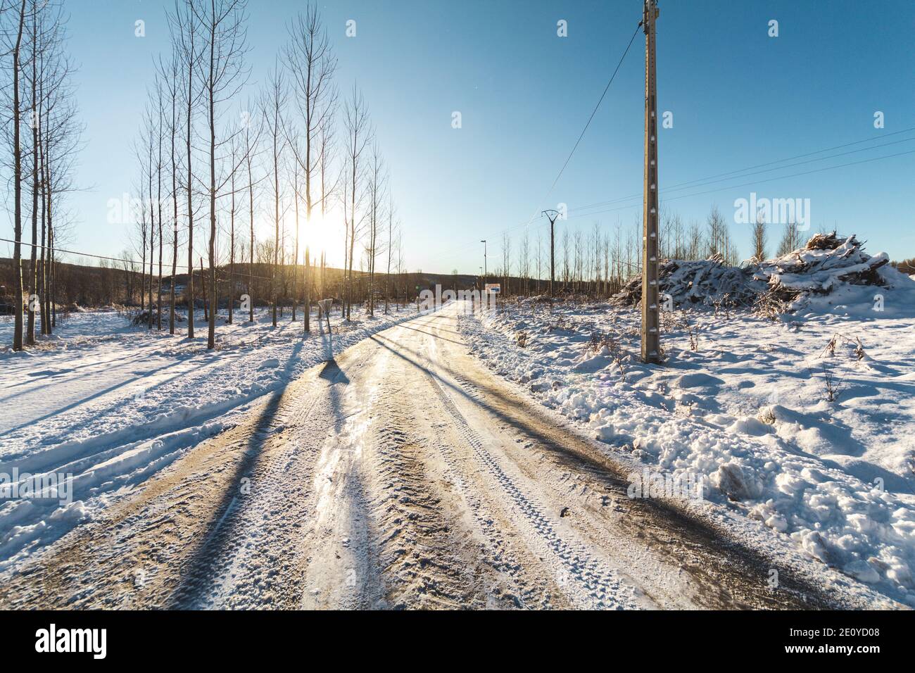 Snowplow on a snowy country road hi-res stock photography and images ...