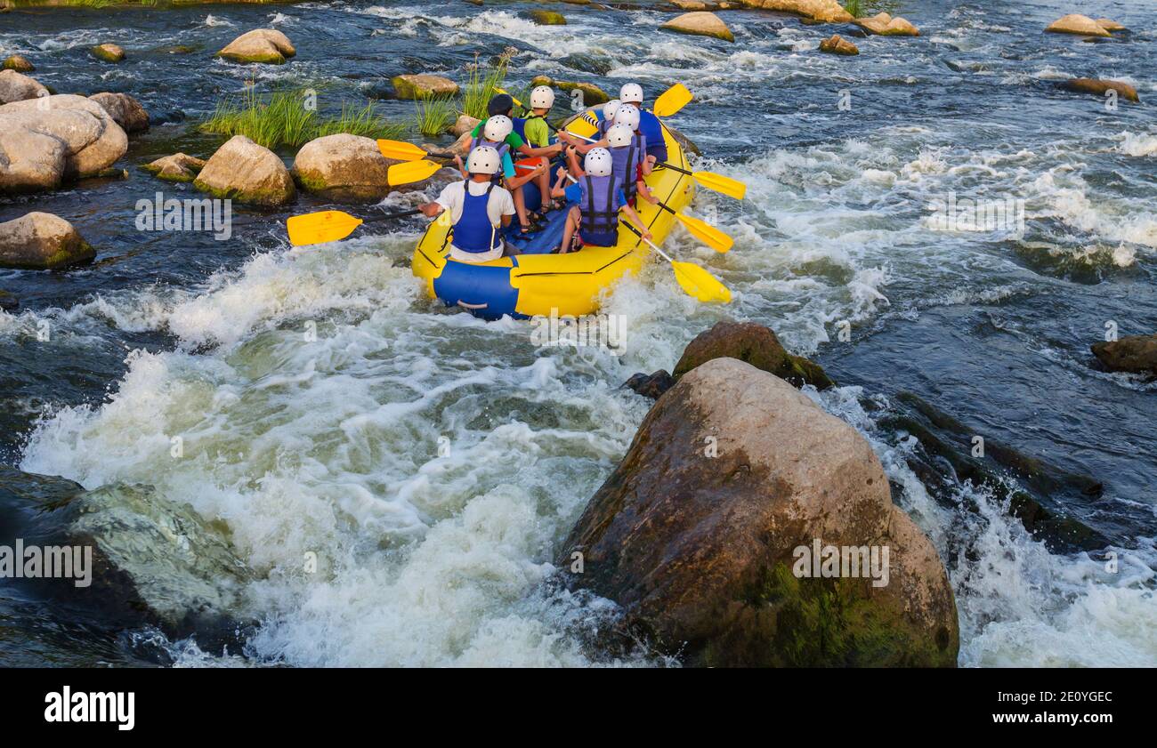 Rafting team , summer extreme water sport Stock Photo - Alamy