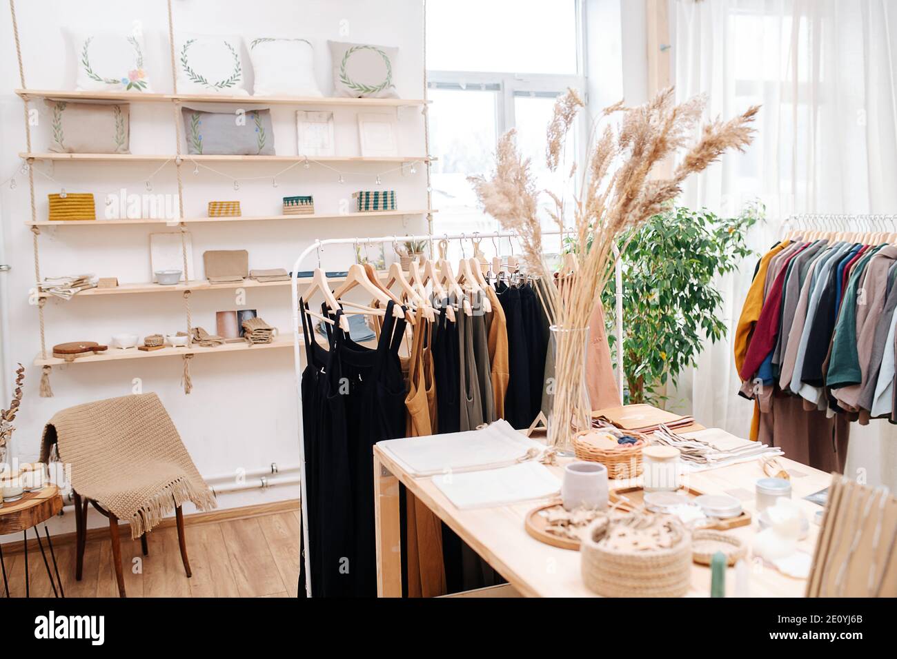 Ecological shop with shelves and rack filled with plastic free items ...
