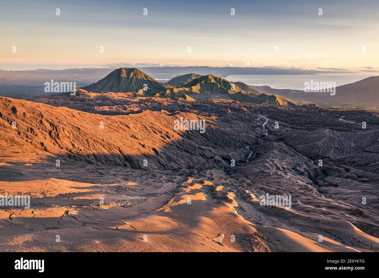 View of the surrounding landscape and the sea from Dukono volcano ...