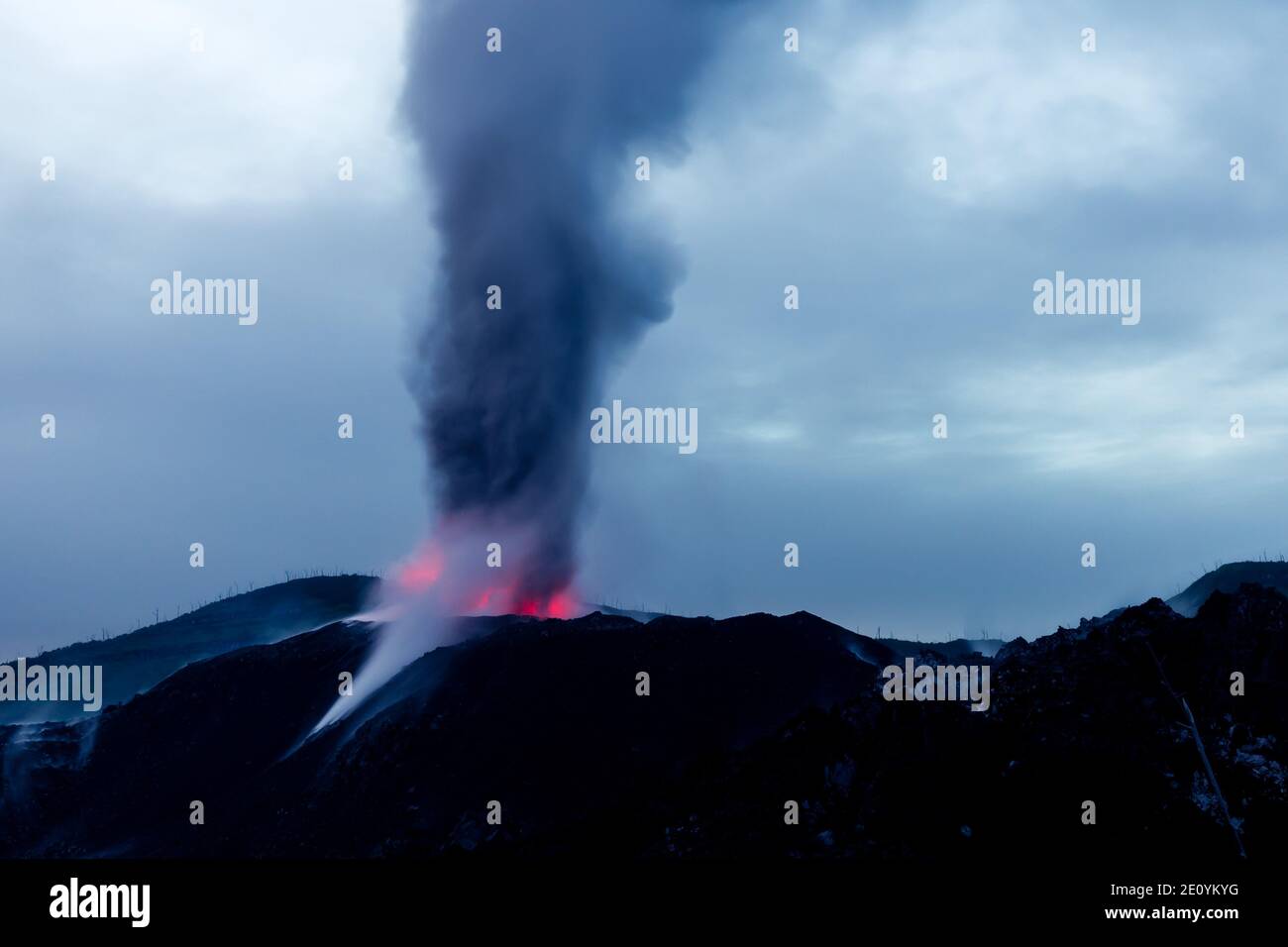 Smoke rising from Ibo volcano, Halmahera, Indonesia Stock Photo - Alamy