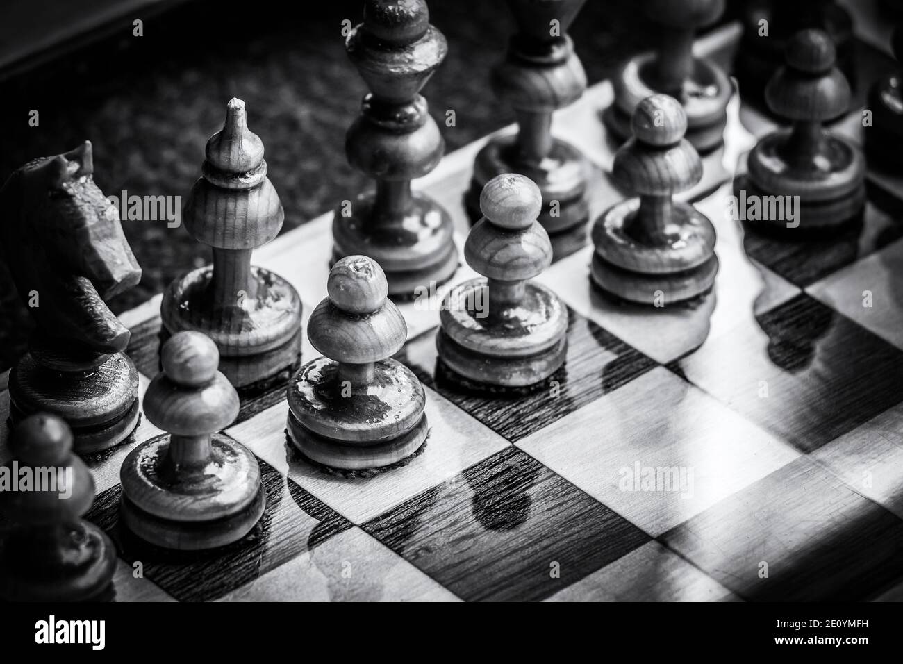 Chess pieces are placed in the starting position. Black and white photo ...