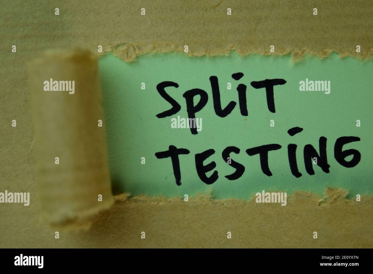 Split Testing Text written in torn paper Stock Photo - Alamy