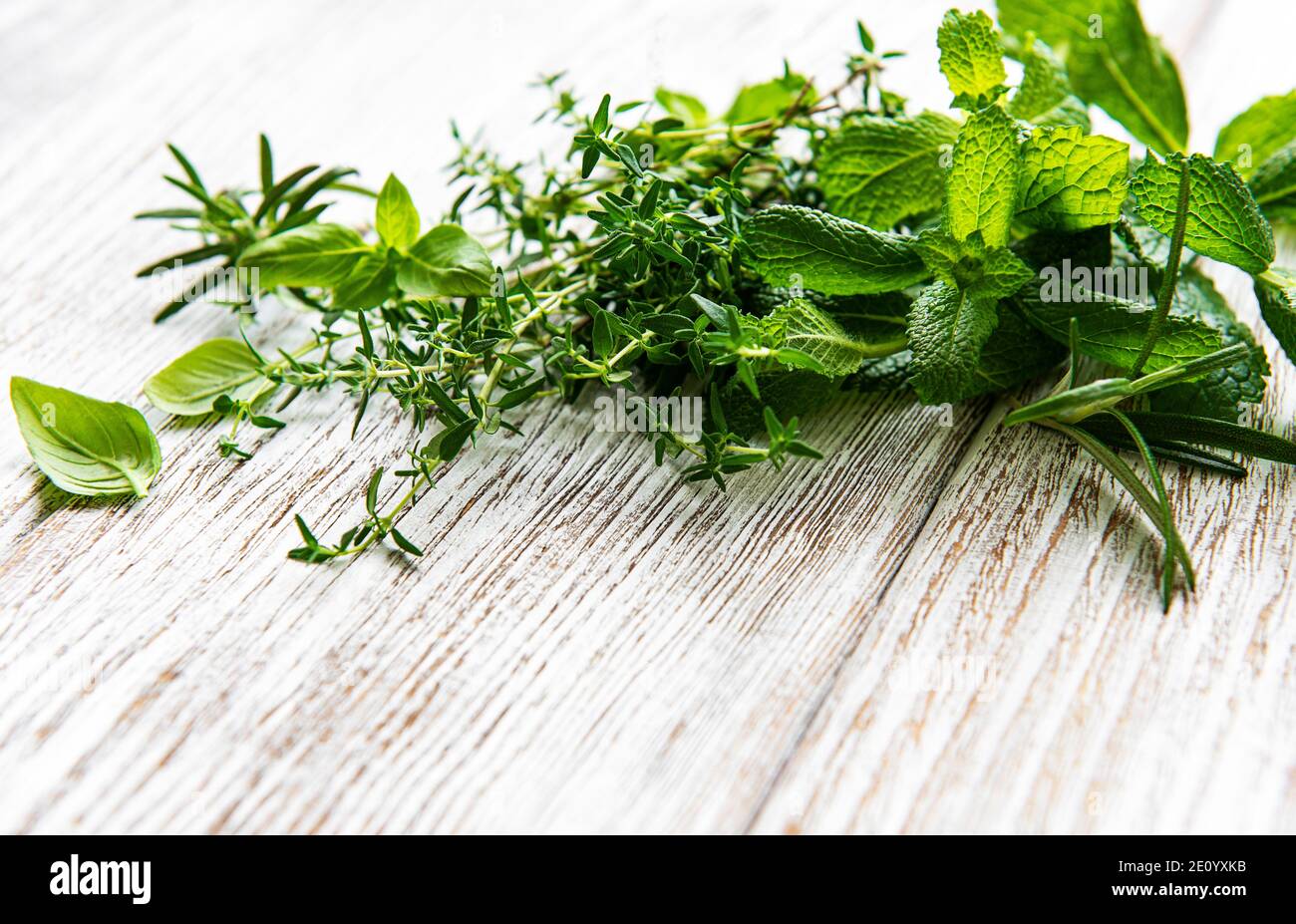 Fresh herbs cut in home garden, on wooden rustic table Stock Photo - Alamy