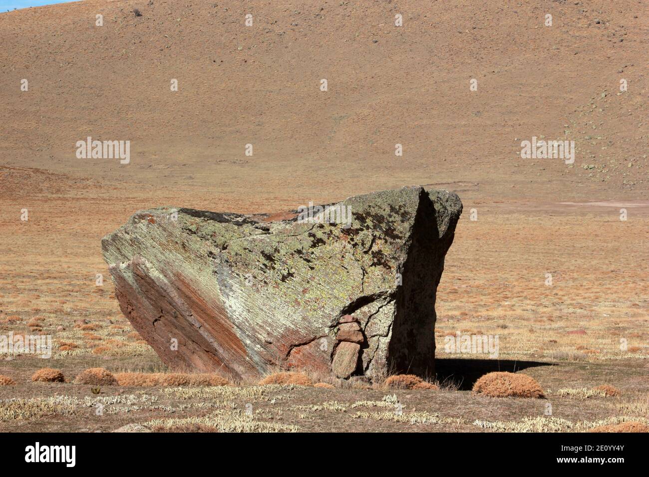 Steppe landscape and big rock. Volcanic trough Stock Photo - Alamy