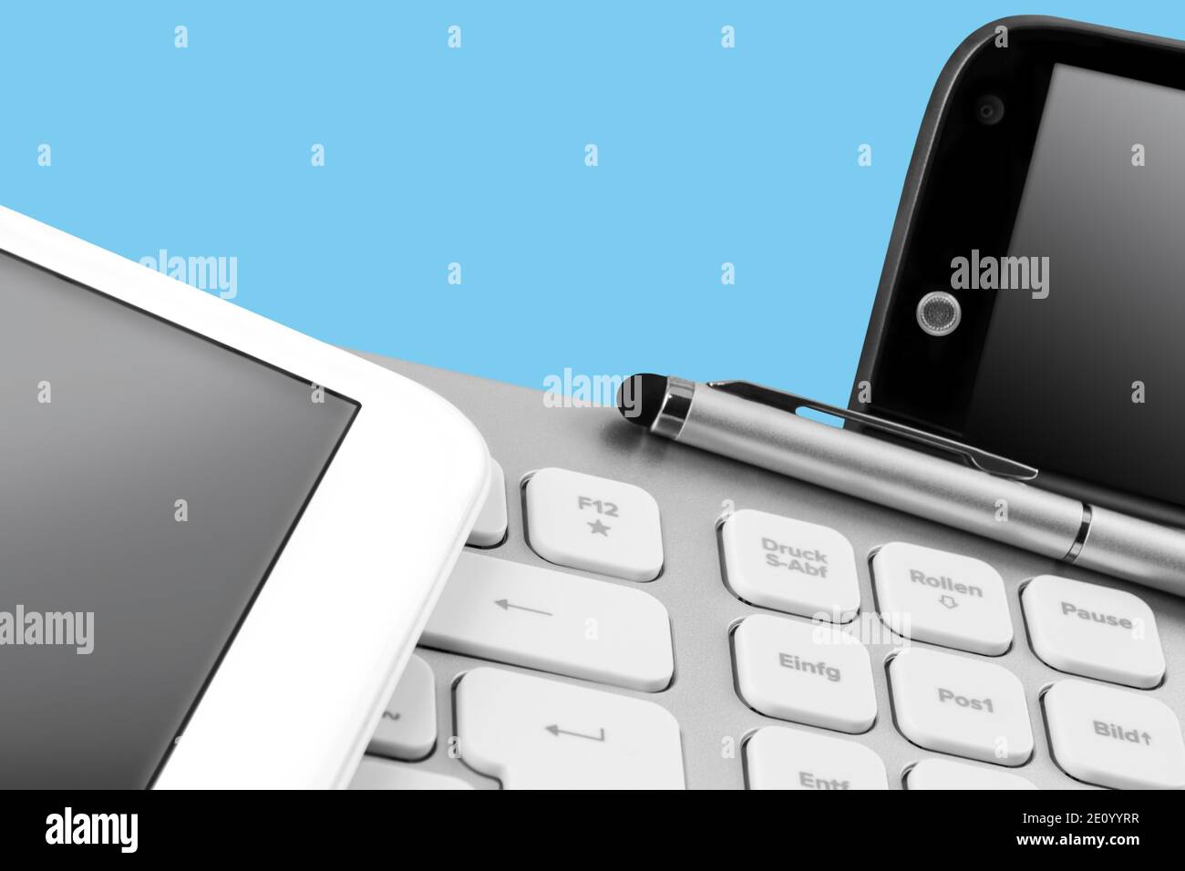 Tablet with PC keyboard and mobile Stock Photo - Alamy