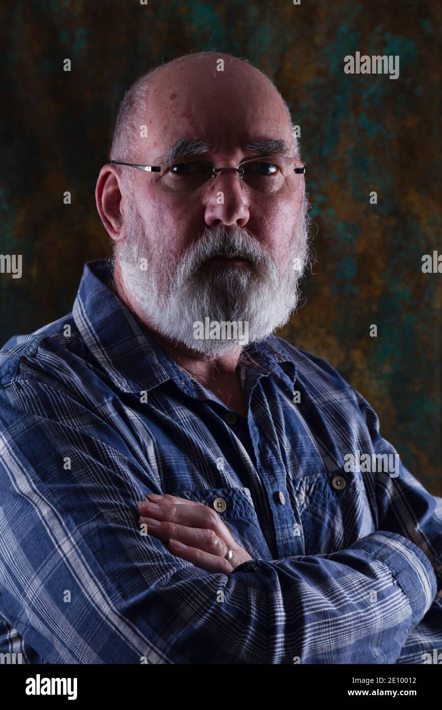 Portrait of an old man in his 70s Stock Photo - Alamy