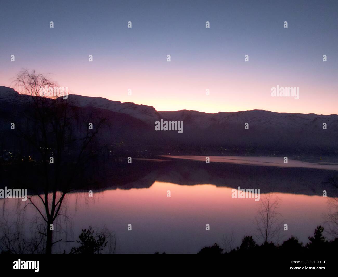 Beautiful sunset view behind the mountains Stock Photo - Alamy