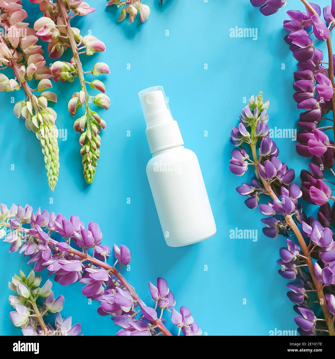 Top view and close-up of white plastic spray bottle mock-up and flower ...