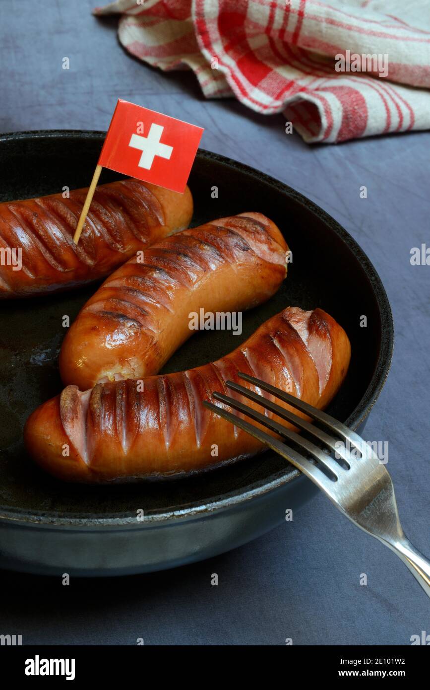 Fried Cervelat in pan, Switzerland, Europe Stock Photo - Alamy