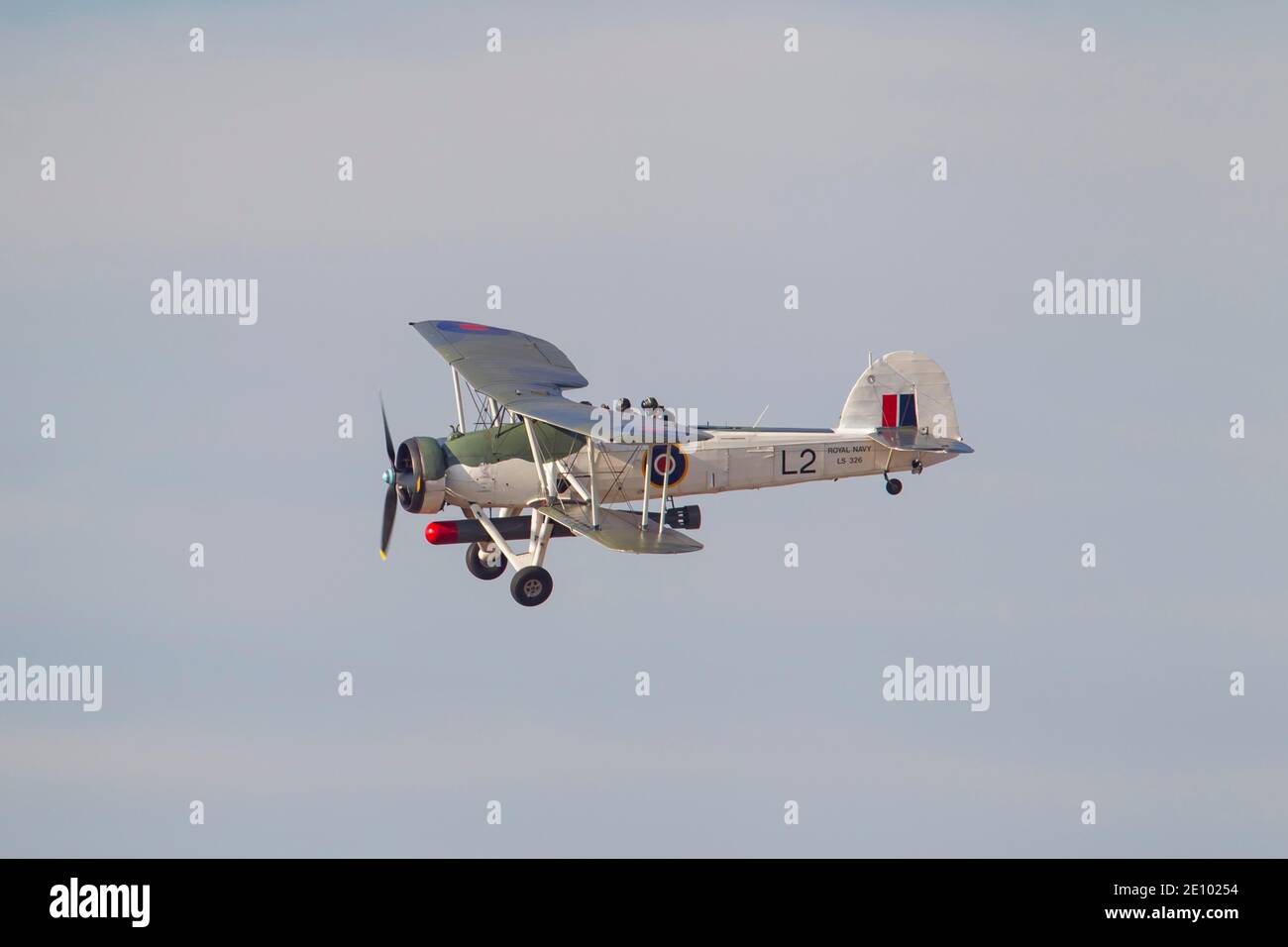 Fairey Swordfish aircraft in flight in Royal Navy markings ...