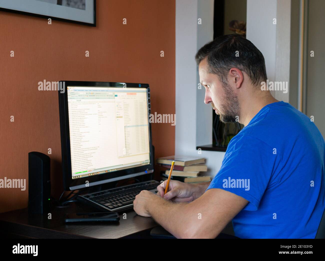 Manager works on computer sitting hi-res stock photography and images ...