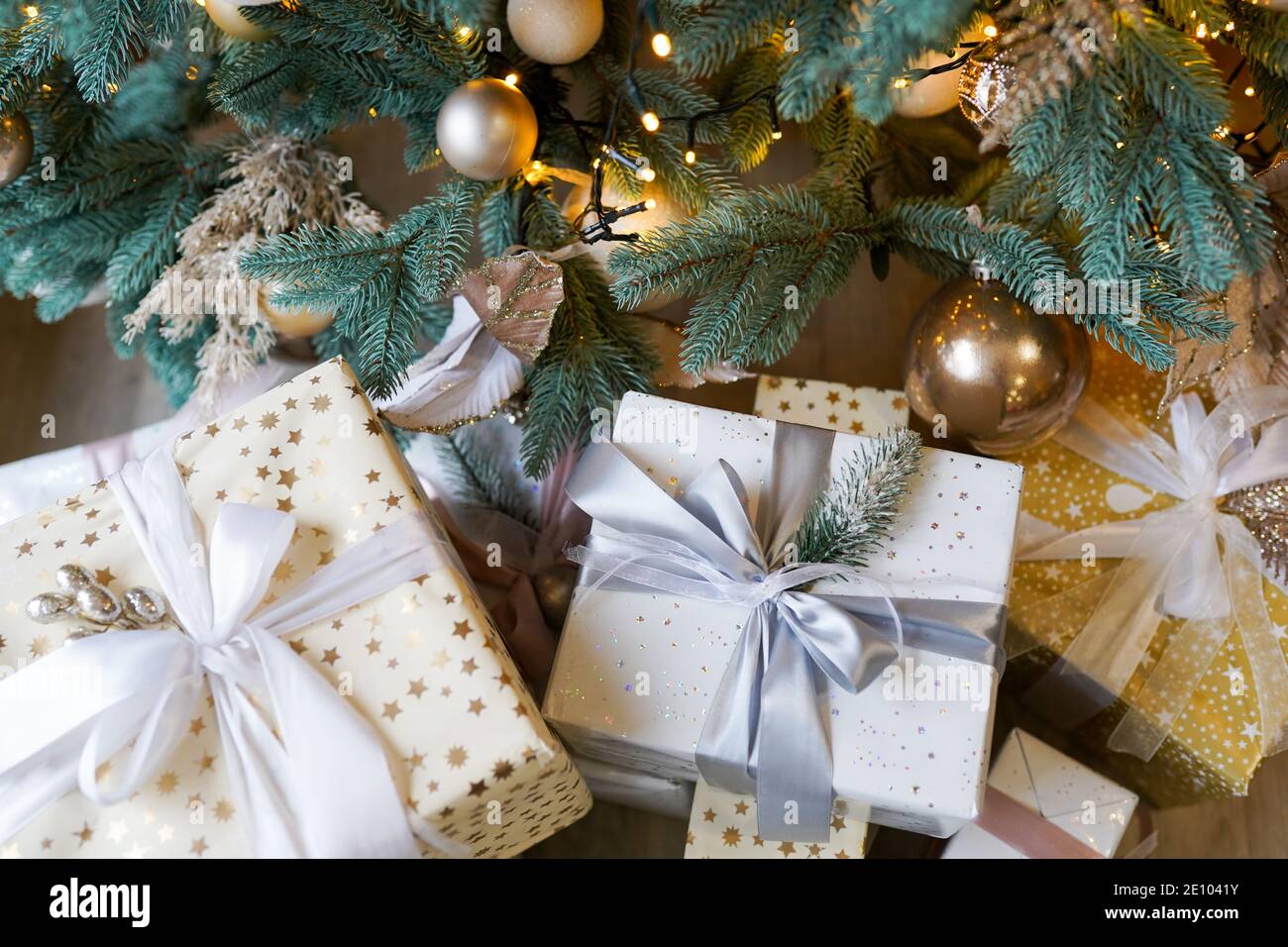 Presents under a christmas tree hi-res stock photography and images - Alamy