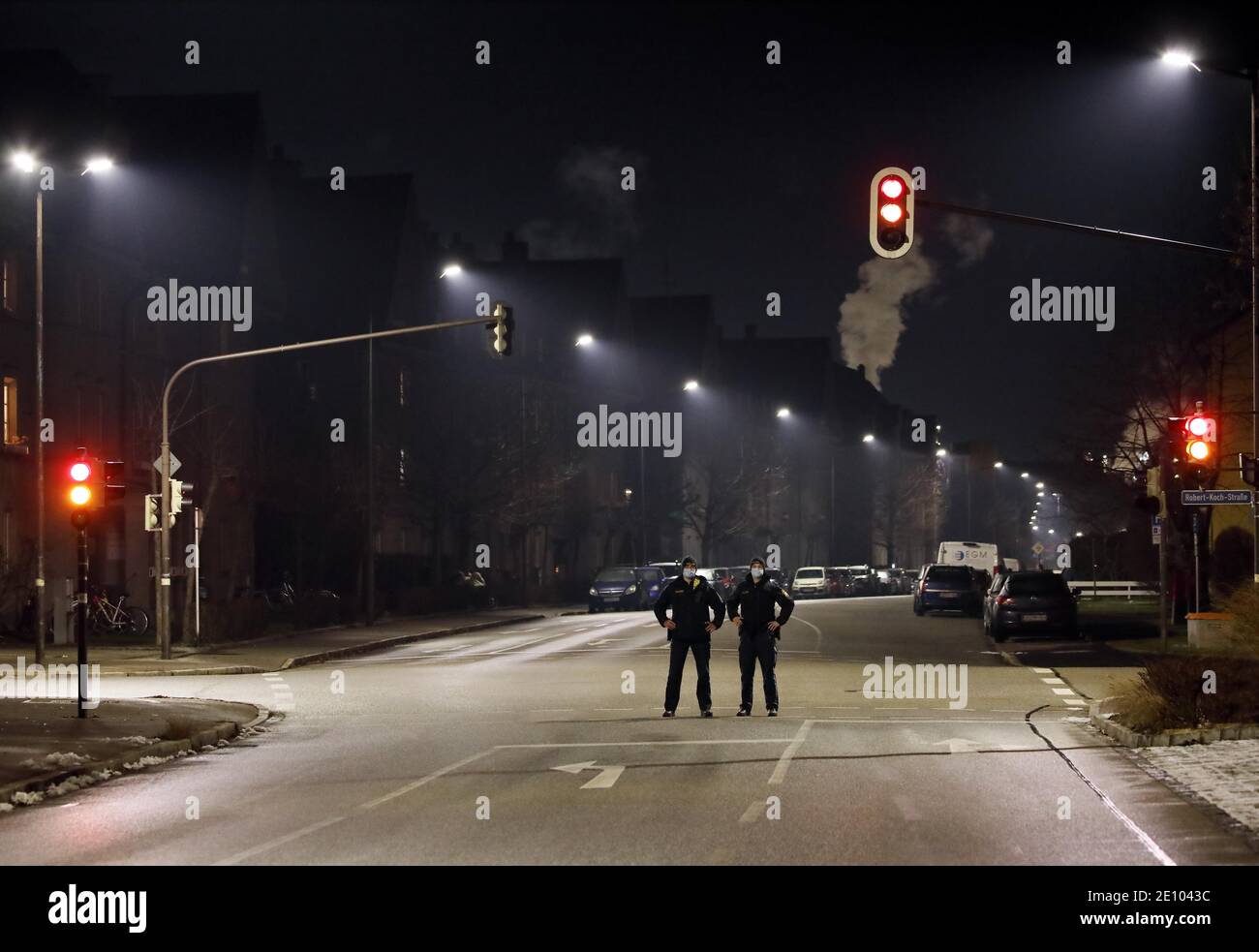 Measures against Corona pandemic, police officers control night curfew ...