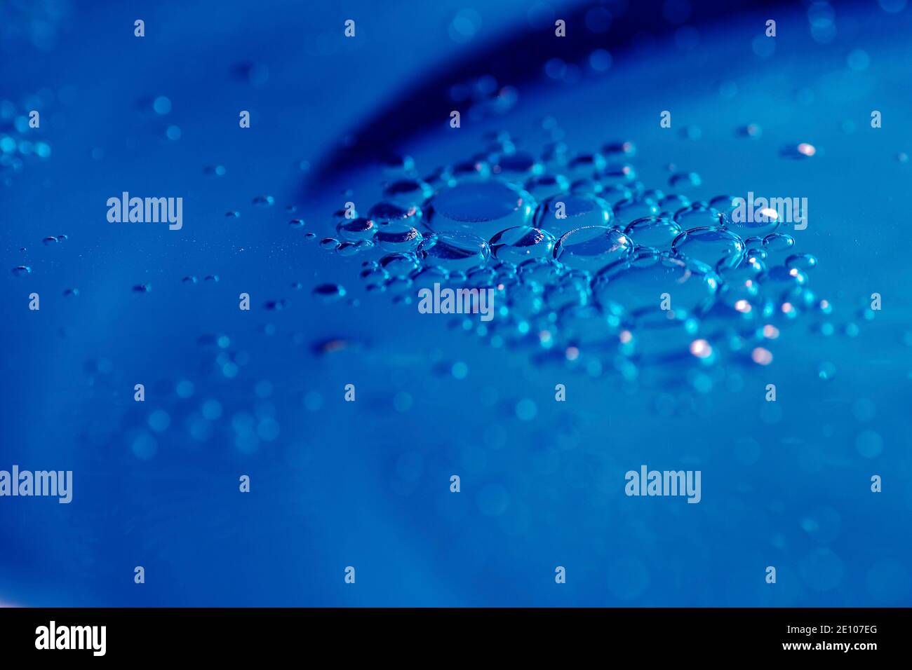 fat on the surface in blue water sideview Stock Photo - Alamy