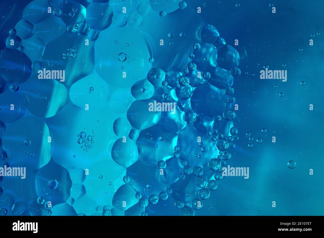fat in blue water close-up on the surface Stock Photo - Alamy