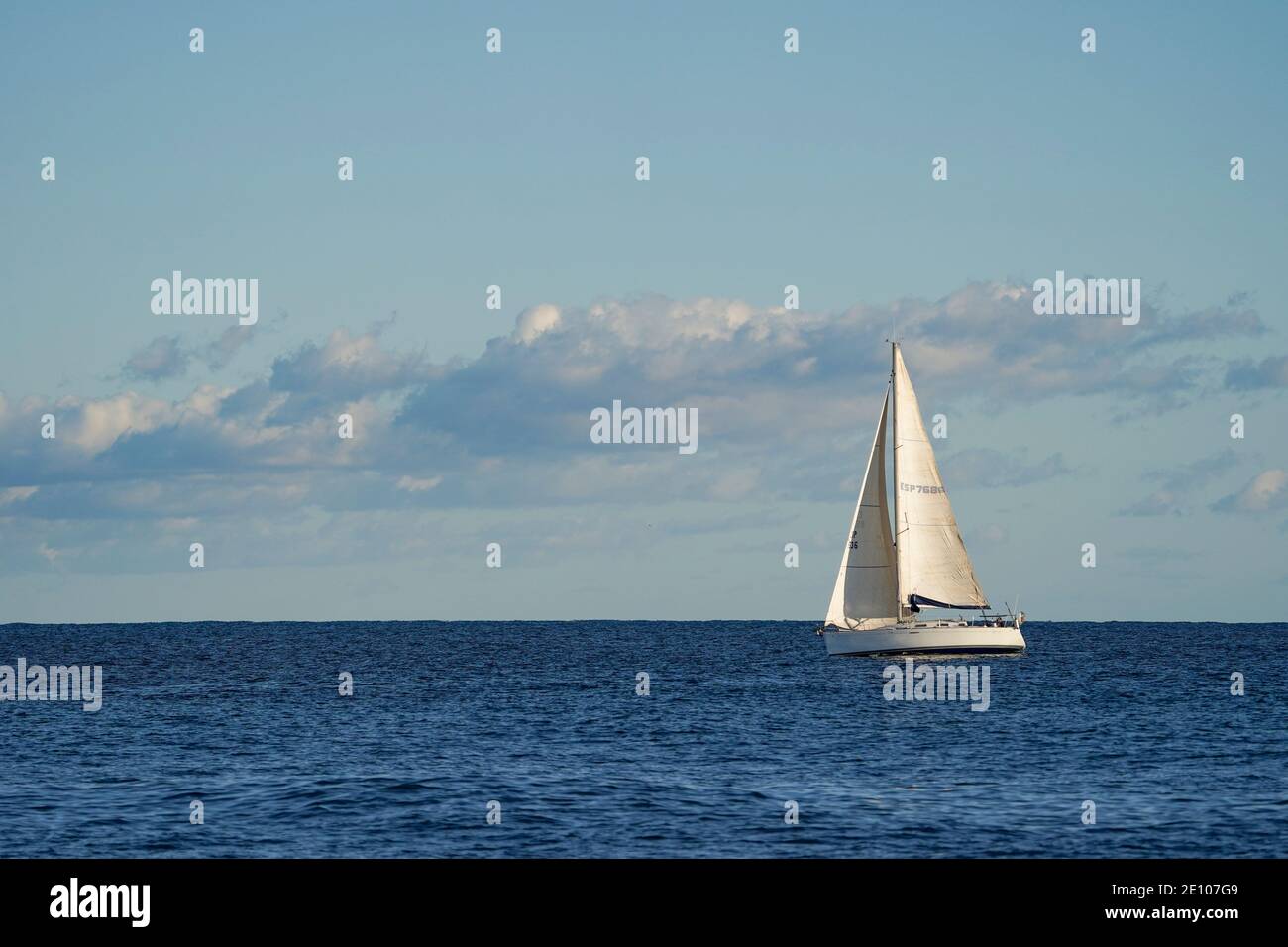 Sail boat sailing in front of the coast of Fuengirola, Andalusia, Spain ...