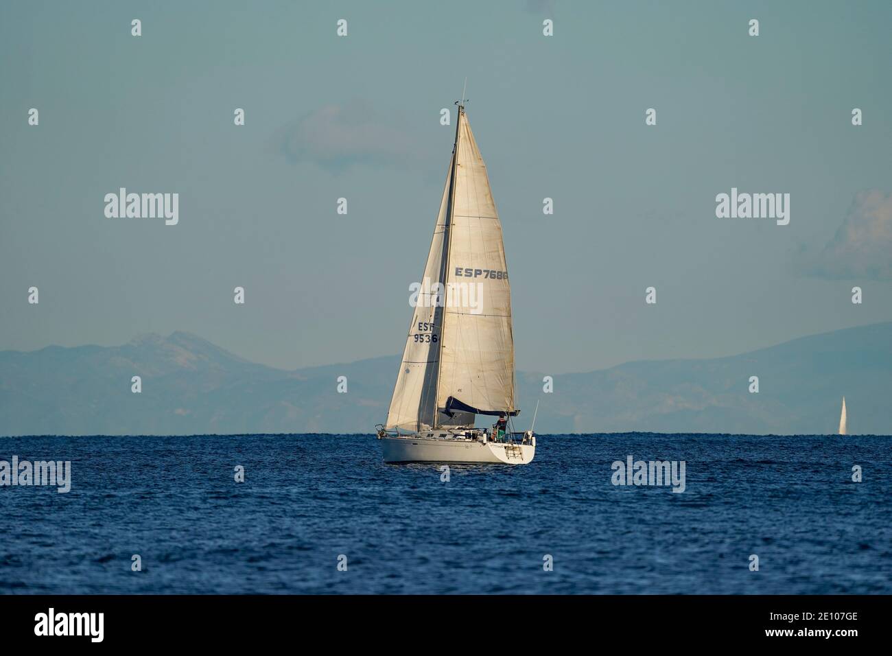 Sail boat sailing in front of the coast of Fuengirola, Andalusia, Spain ...