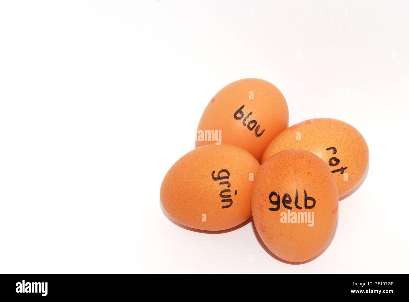 four german labeled eggs for easter on white background Stock Photo - Alamy