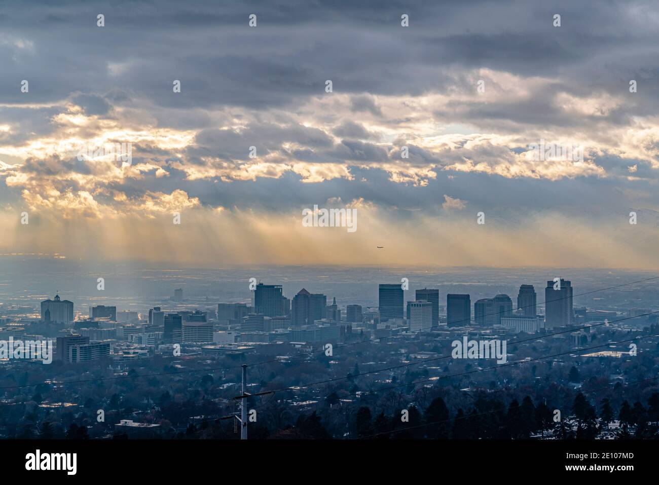 Skyscrapers and buildings on a city landscape with sunlight and ...