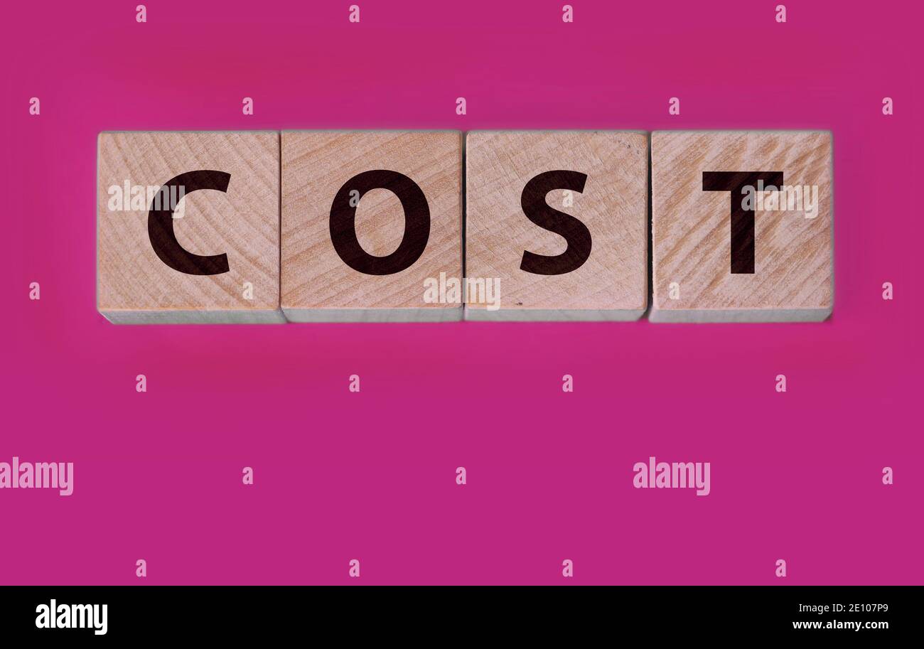 Word Cost made with wood building blocks. Expences business concept ...