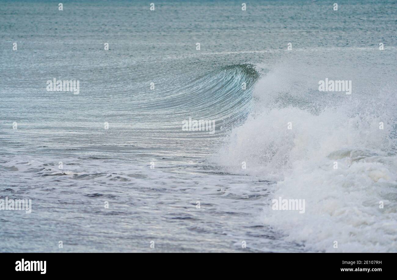 Breaking waves on coast in Spain, Andalusia, Spain Stock Photo - Alamy
