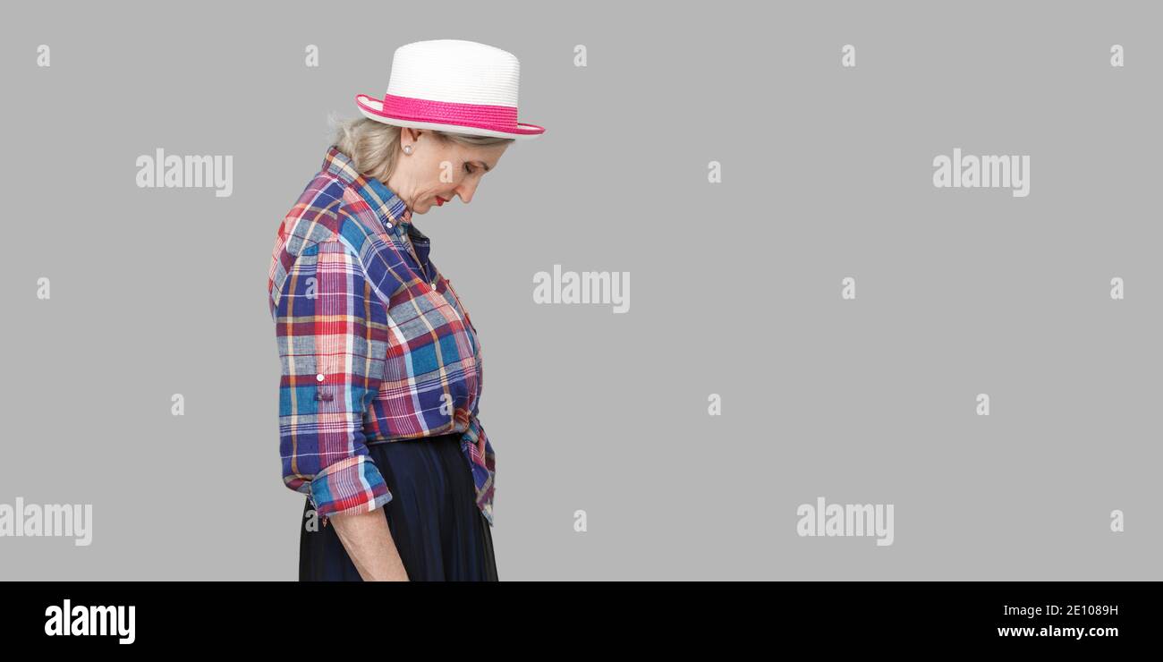 Profile side view portrait of sad alone stylish mature woman in casual ...