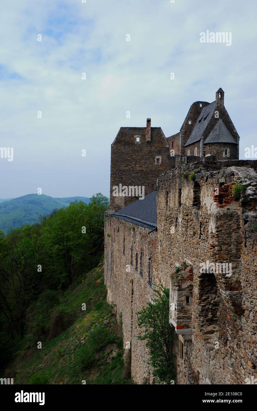 old castle with steep hillside portrait Stock Photo - Alamy