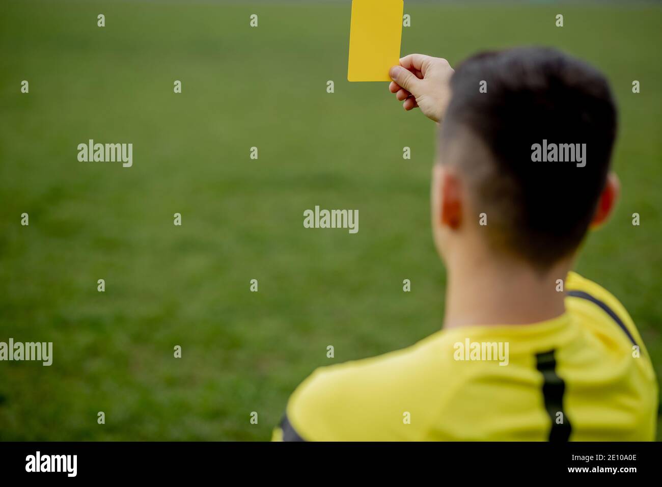Referee showing a red card to a displeased football or soccer player ...