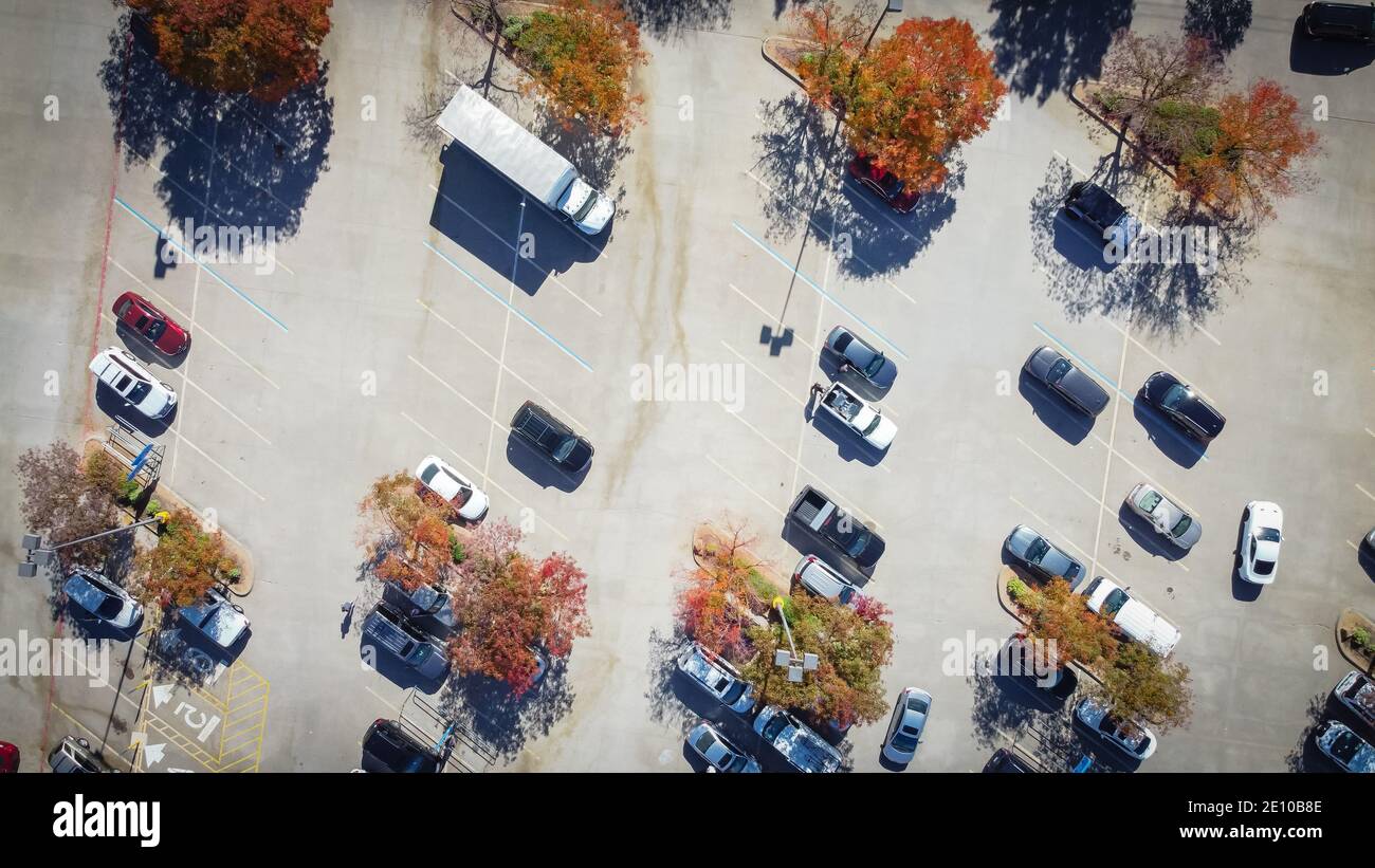 Aerial view parking lot of grocery store with wide variety of cars ...