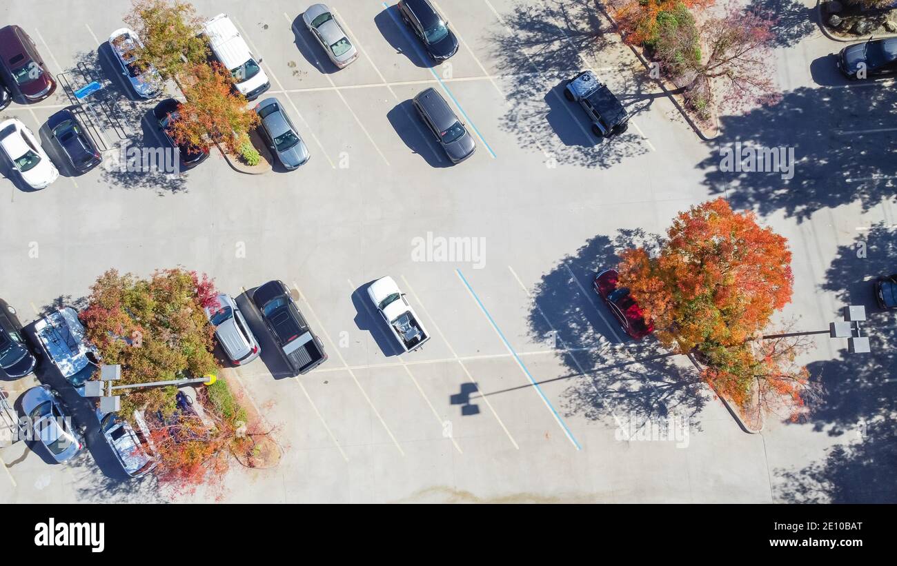 Aerial view parking lot of grocery store with wide variety of cars ...