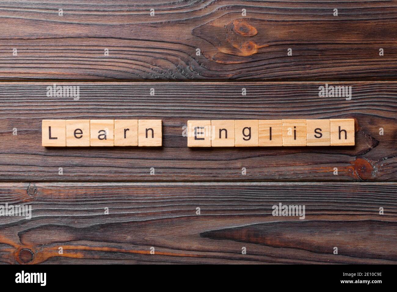 learn english word written on wood block. learn english text on table ...