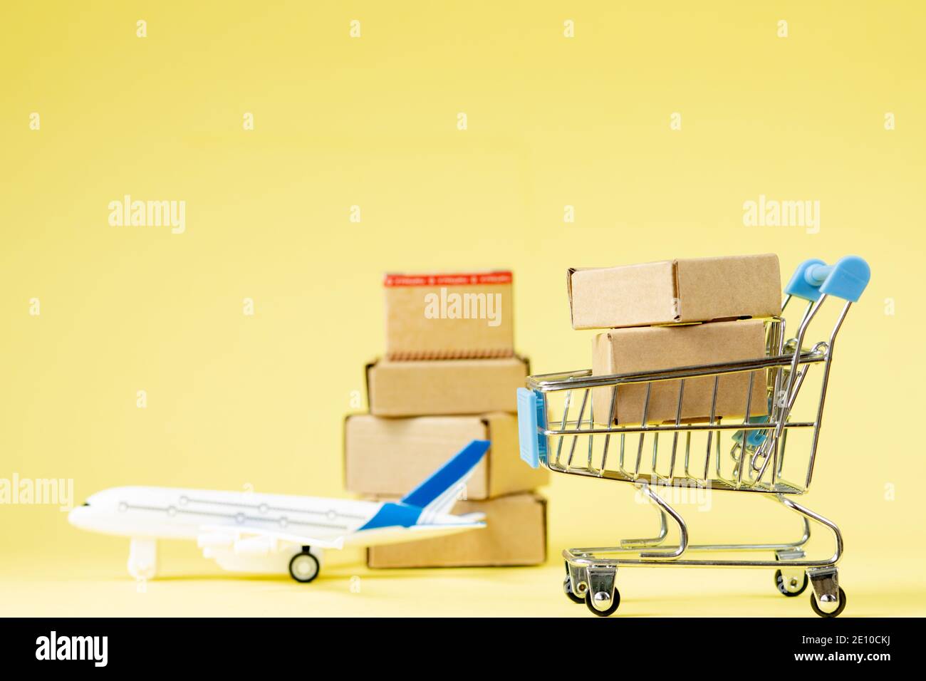 Airplane and stack of cardboard boxes. concept of air cargo and parcels ...