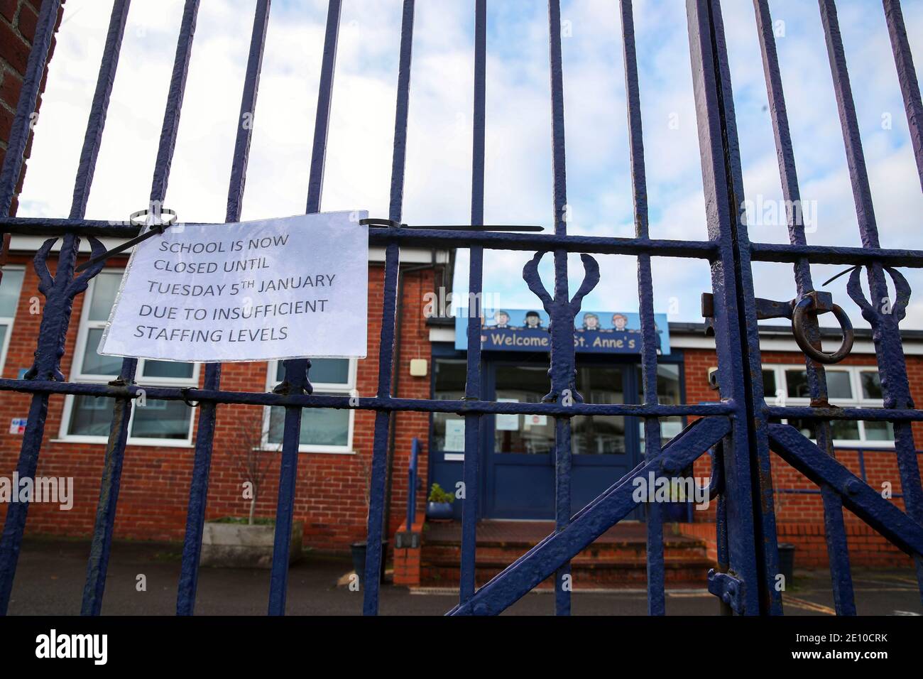 A sign hangs on the gate of St Anne's Catholic Primary school in ...