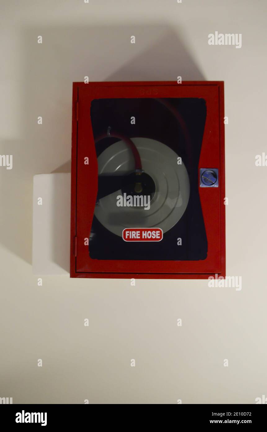 Fire hose wall hi-res stock photography and images - Alamy