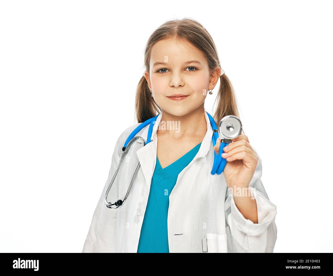 Cute child doctor pediatrician, using a stethoscope. Isolated on white ...