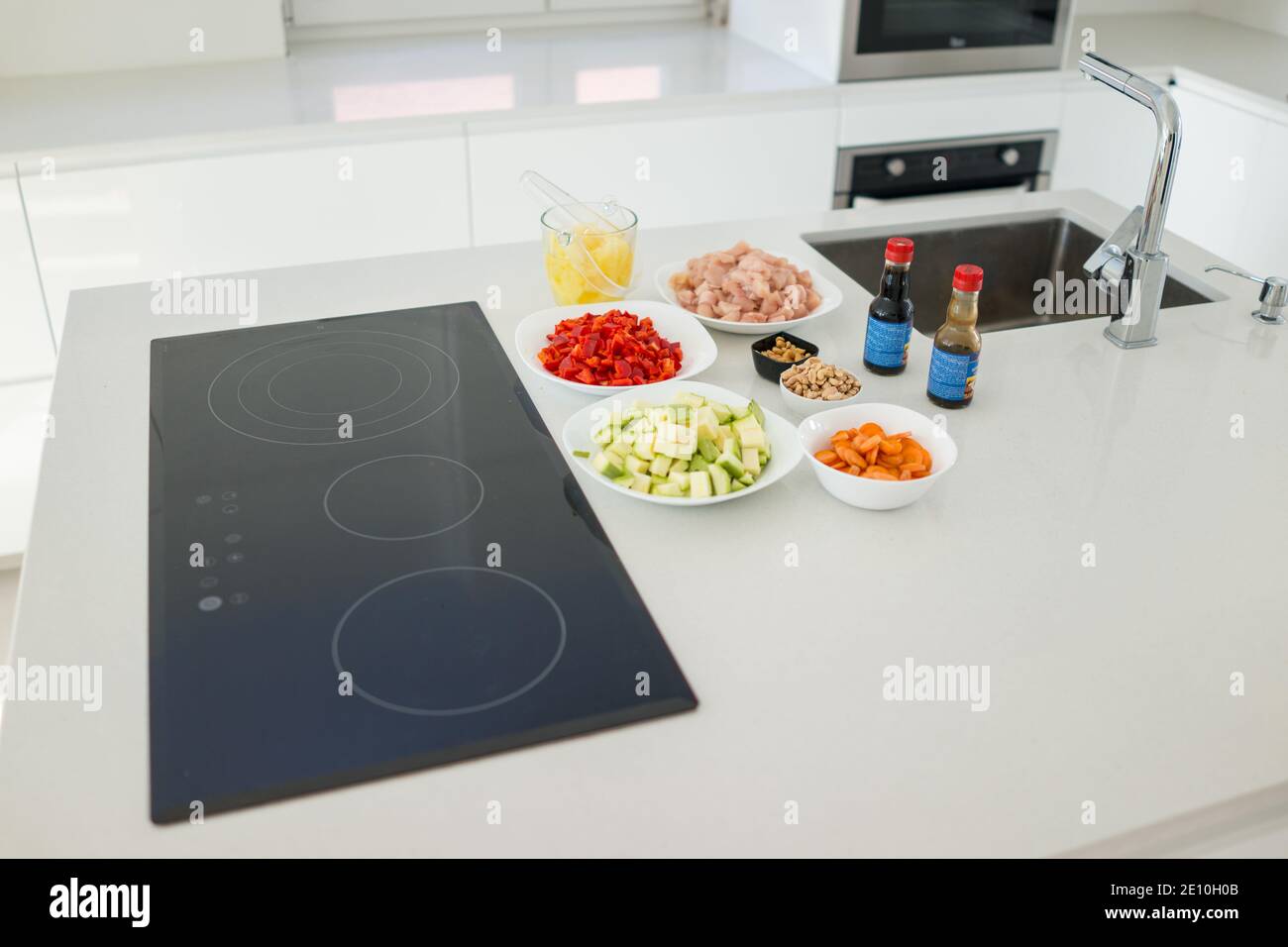 Modern kitchen in beautiful home with food Stock Photo - Alamy