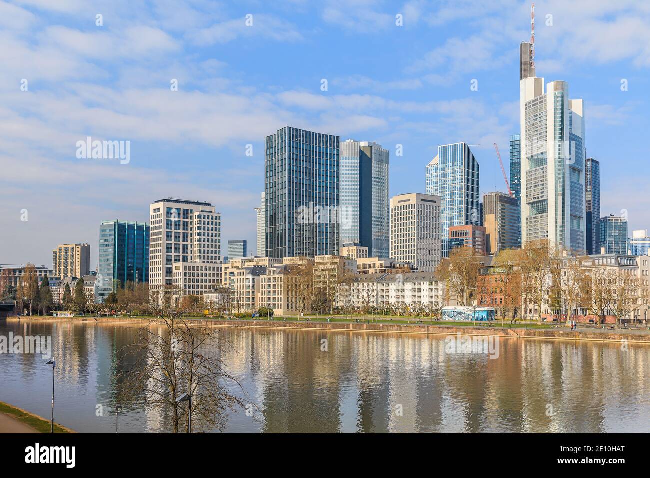 Frankfurt skyline on sunny day. River Main in the foreground. High-rise ...