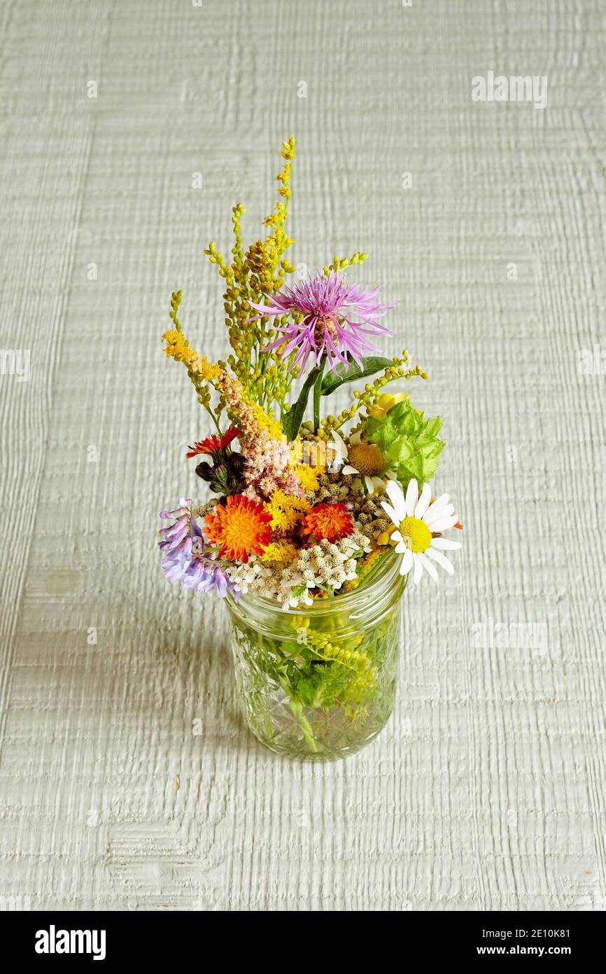 Wildflower Arrangement on an Off-White Wooden Table Top 2 Stock Photo ...