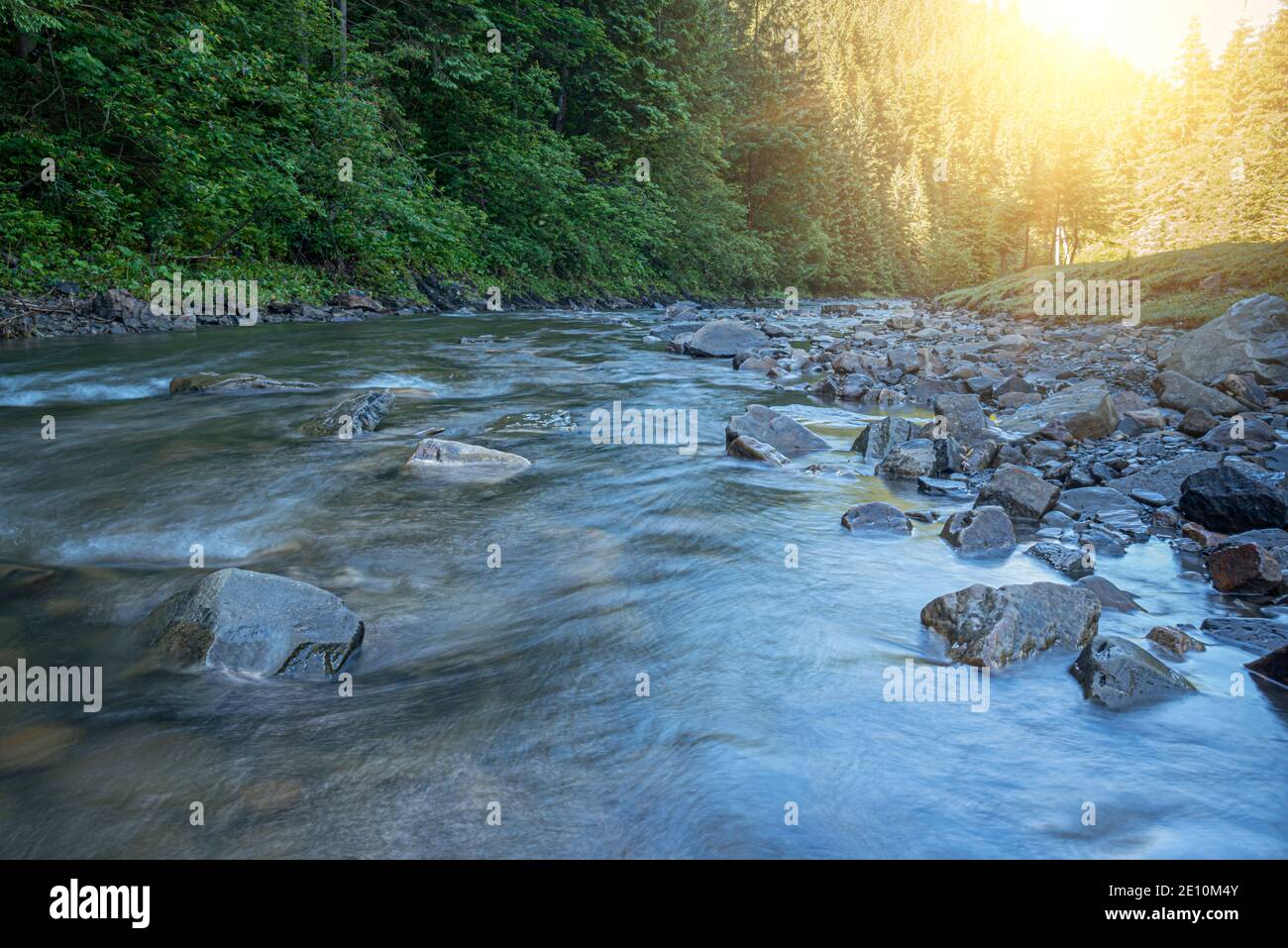 Landscape of a mountain fast river on a clear day Stock Photo - Alamy