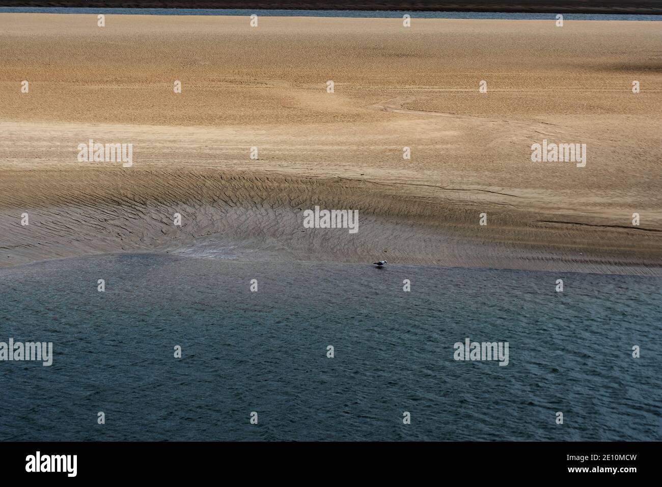 Sand patterns with water Stock Photo - Alamy
