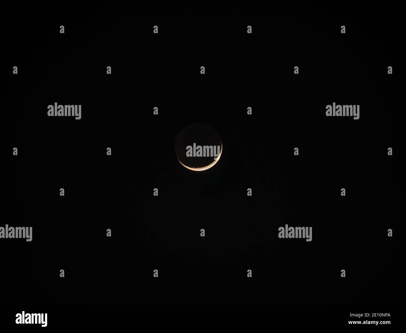 New moon sickle crescent lunar cycle shining glowing in black night sky ...