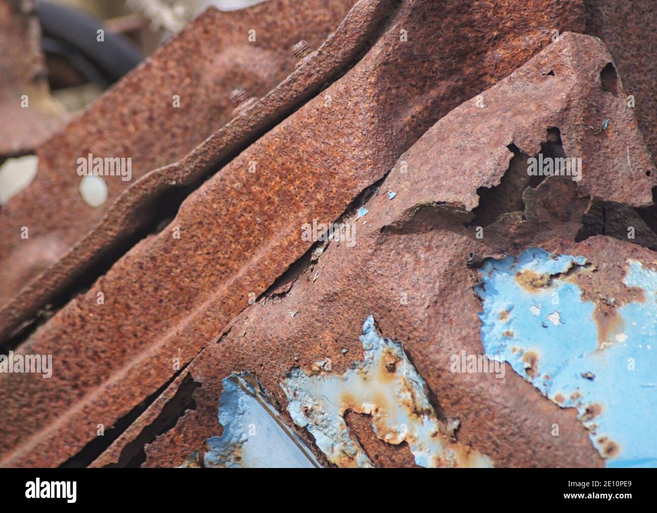 Extreme corrosion in the form of rust on the paintwork of a negected ...