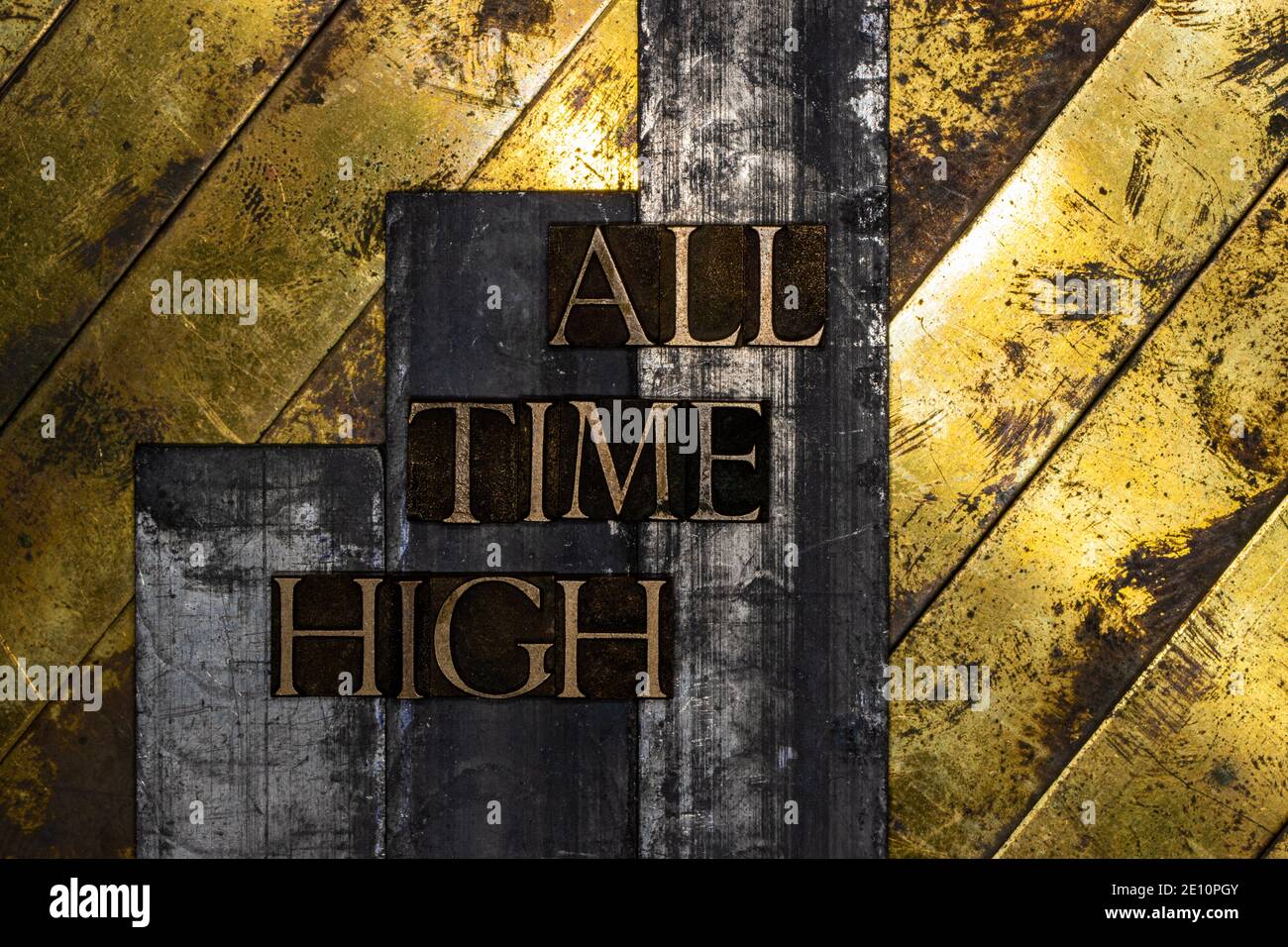 All Time High text on grunge textured authentic copper and gold ...