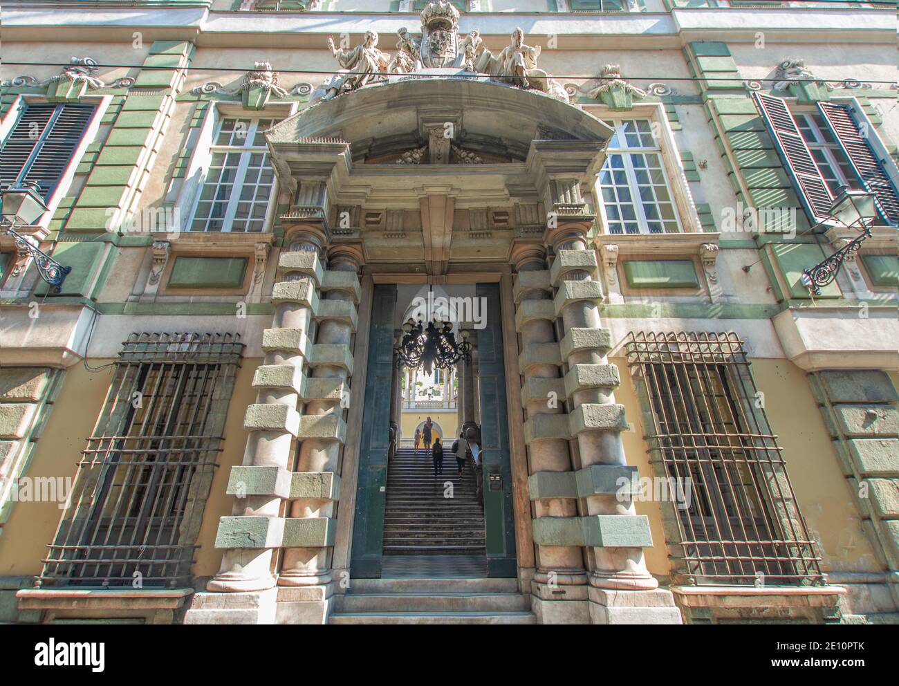 Imposing entrance of the University of Genoa in the historic center of ...