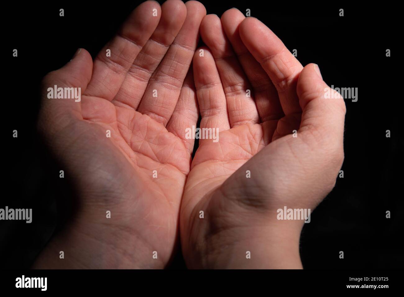empty children hands held out Stock Photo - Alamy