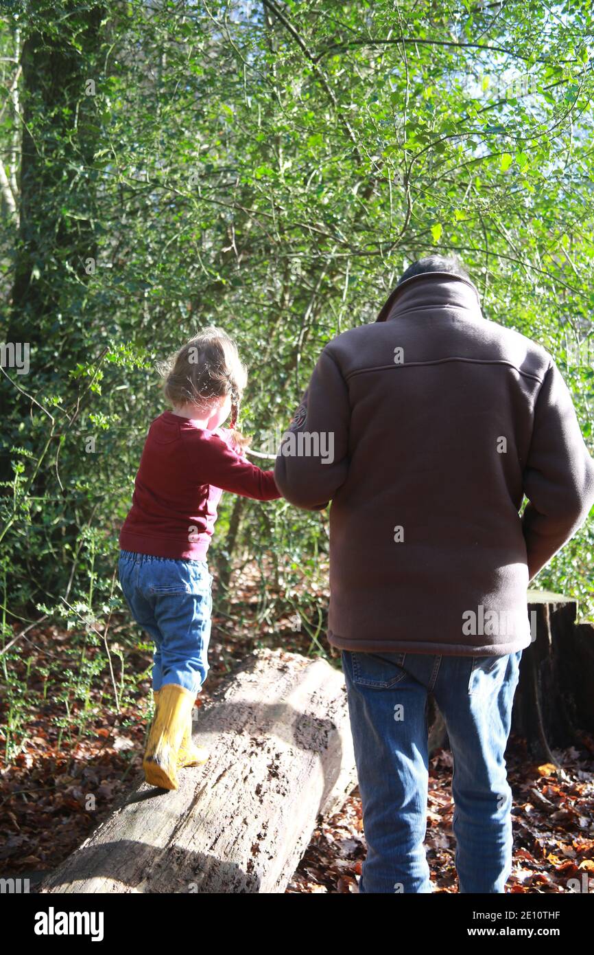 Parent with child on daily walk during lockdown, UK Stock Photo - Alamy
