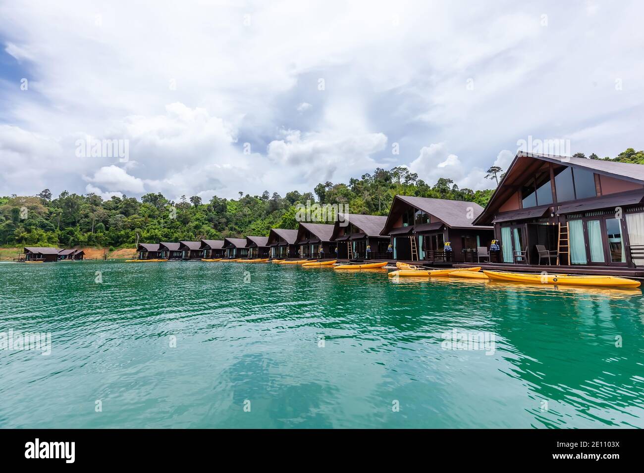 Luxury Resort with Floating Raft Houses on Green Lake with Tropical ...